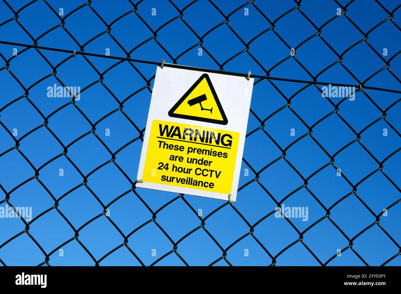 warning these premises are under 24 hour surveillance sign Stock Photo ...