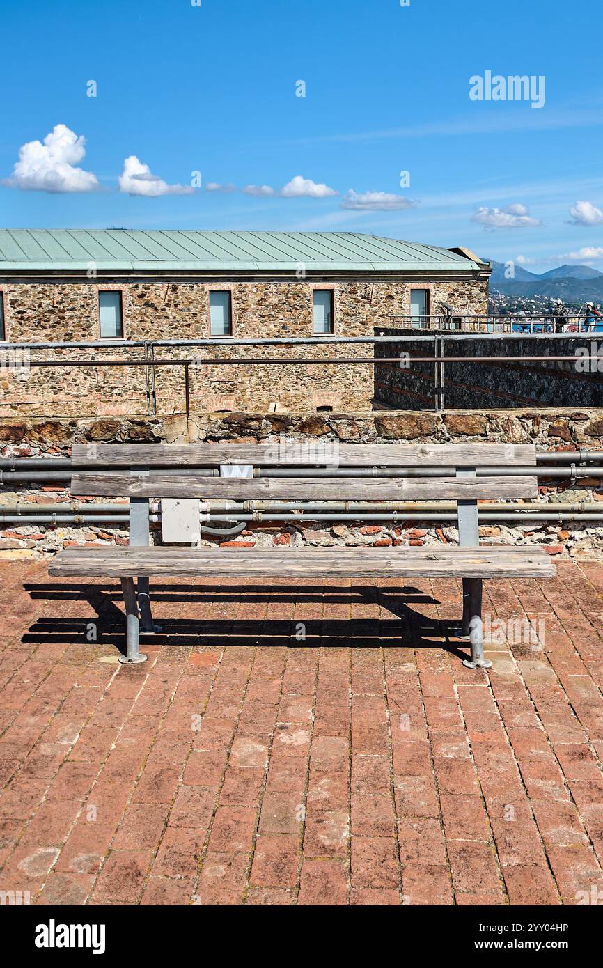 Savona, Italia - December 18, 2024: Brick-paved rooftop with an outdoor ...