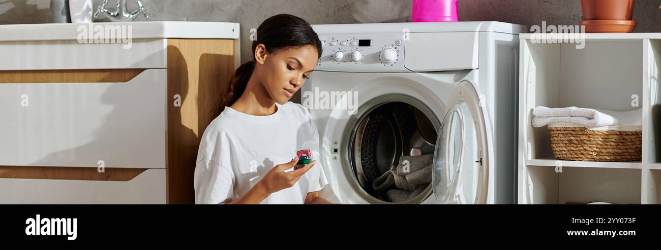 Bright and tidy apartment with a young woman managing her cleaning ...