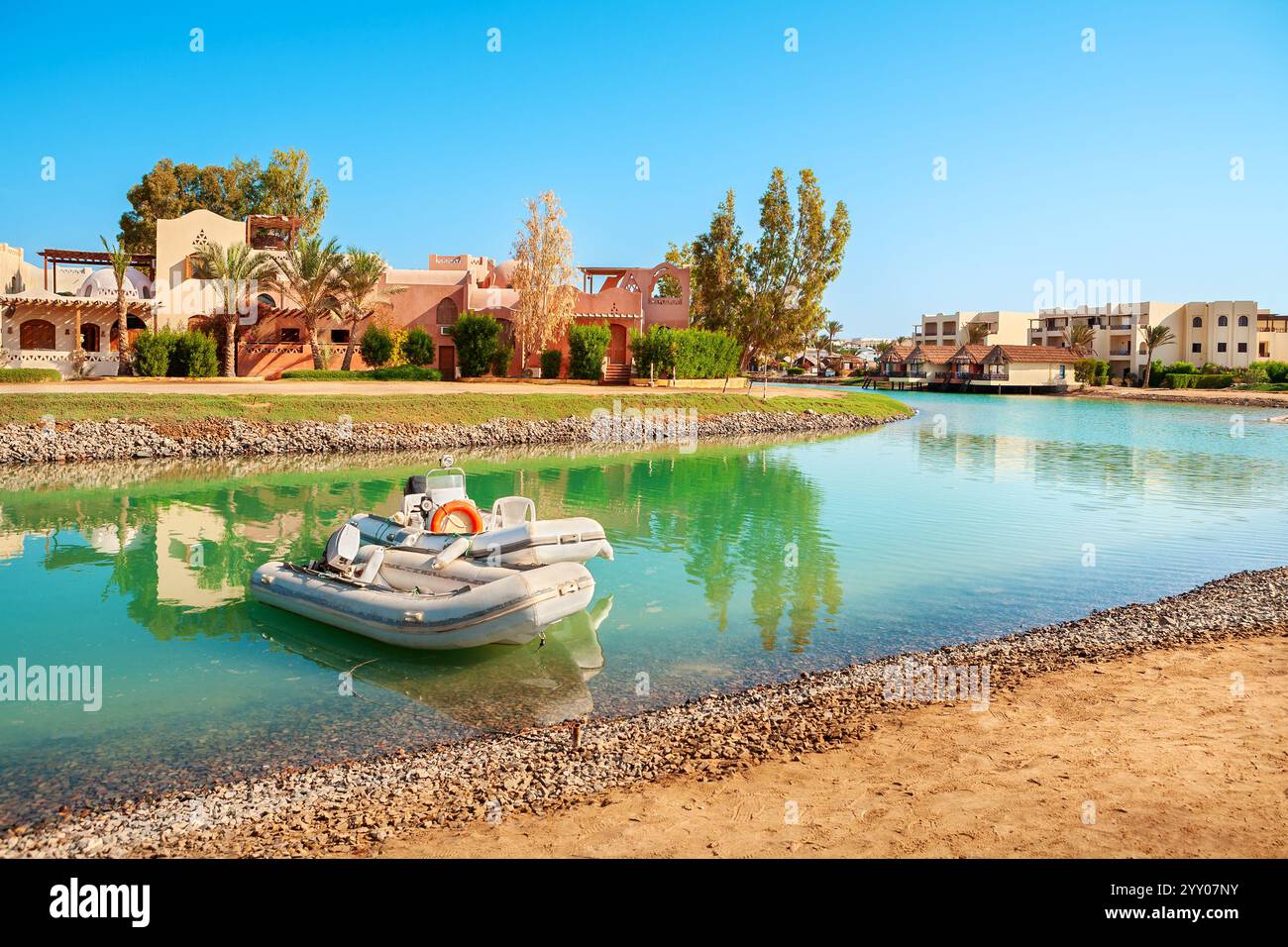 View of water canal, boats and houses at El Gouna town. Egypt, North ...