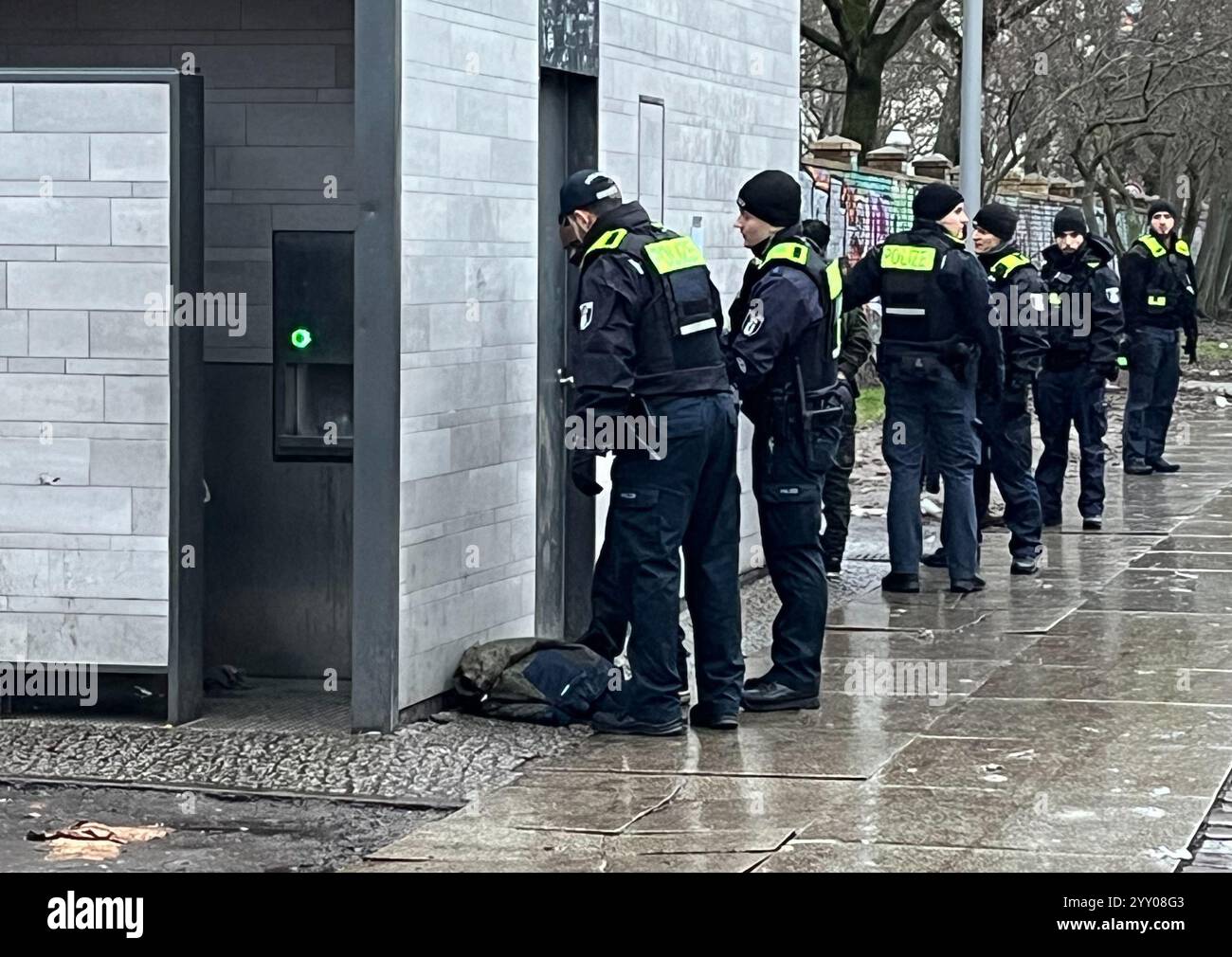 15 December 2024, Berlin: Police officers are on duty in front of ...