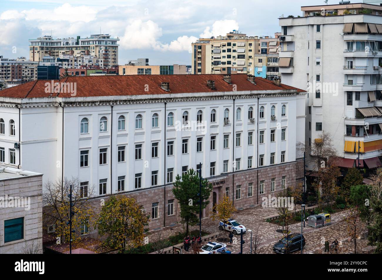 University building and colorful apartment blocks, high angle view of ...