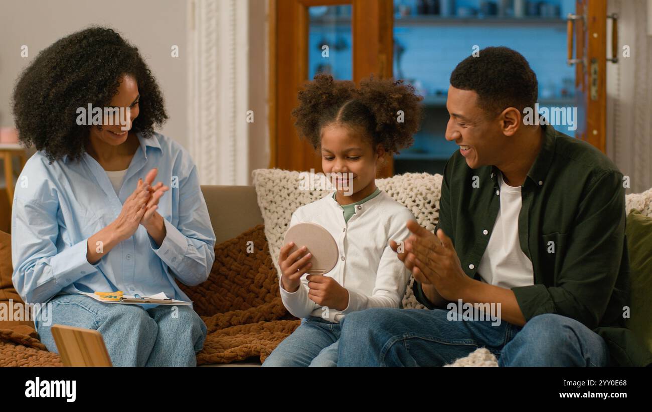 African American speech therapist mother father parents family child ...