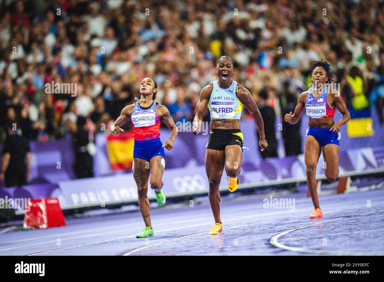 Julien Alfred winning in the 100 meters relay at the Paris 2024 Olympic ...