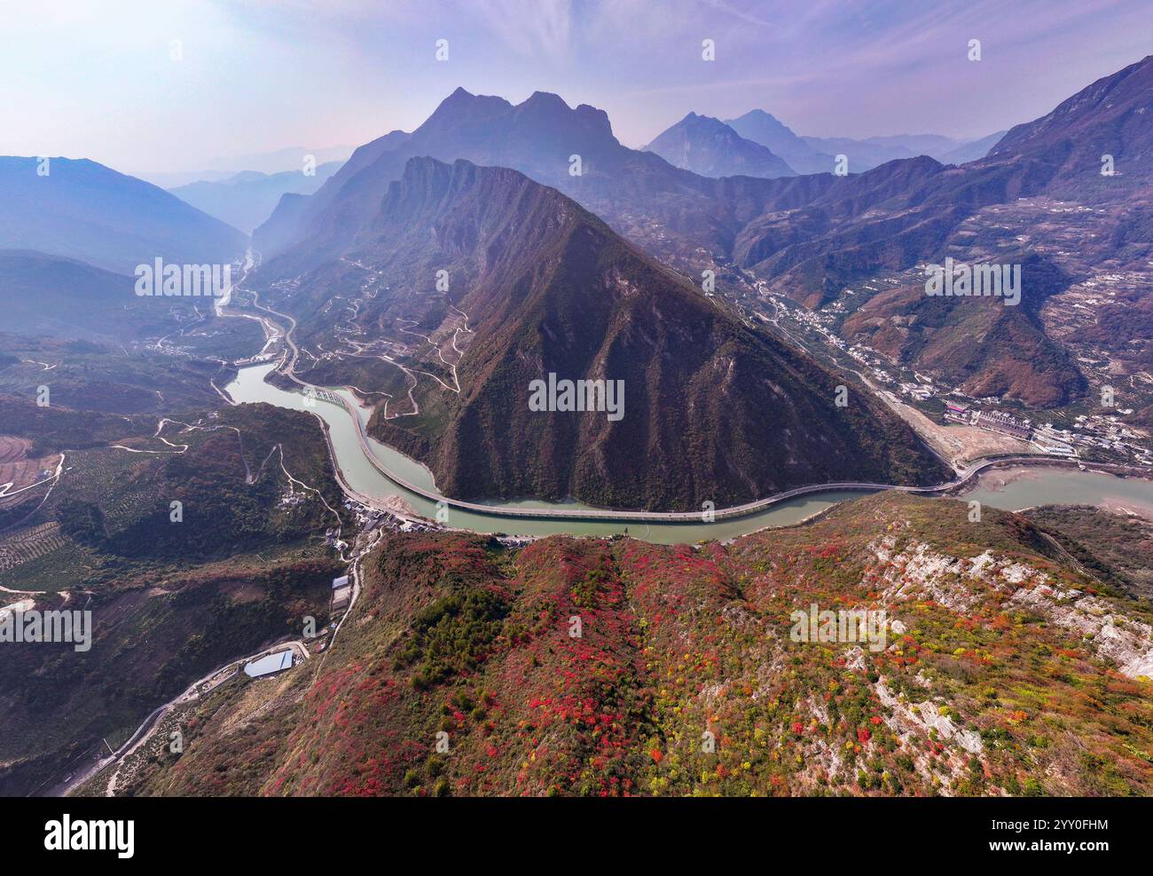 Vehicles drive on the Guzhao water highway in Xingshan county, Yichang ...