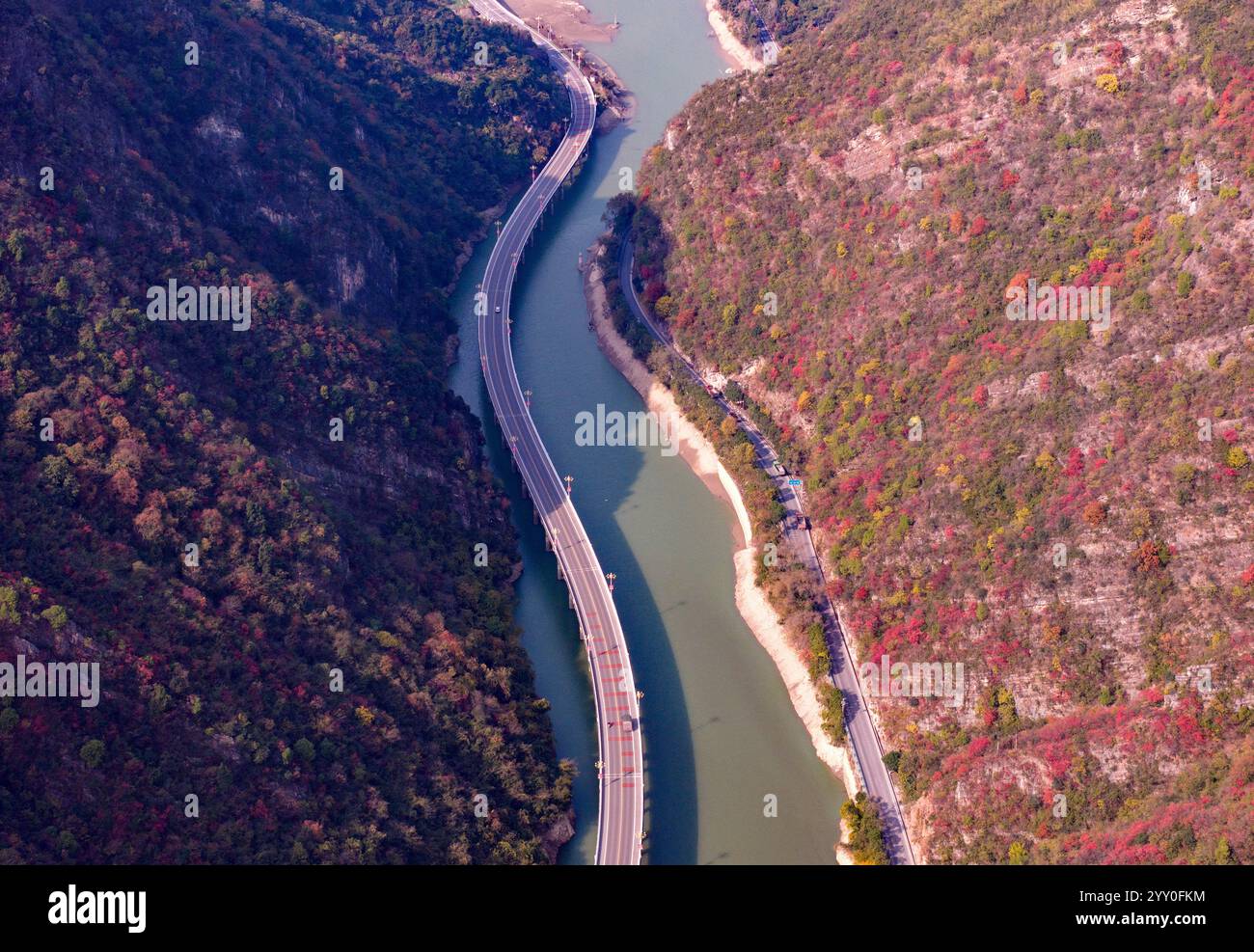 Vehicles drive on the Guzhao water highway in Xingshan county, Yichang ...