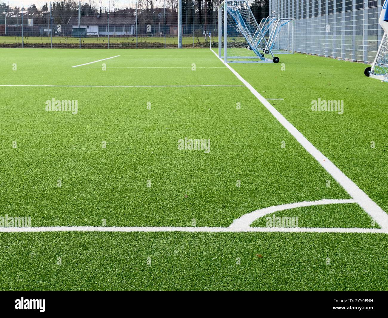 Empty part Soccer pitch from a corners view with a goal Stock Photo - Alamy