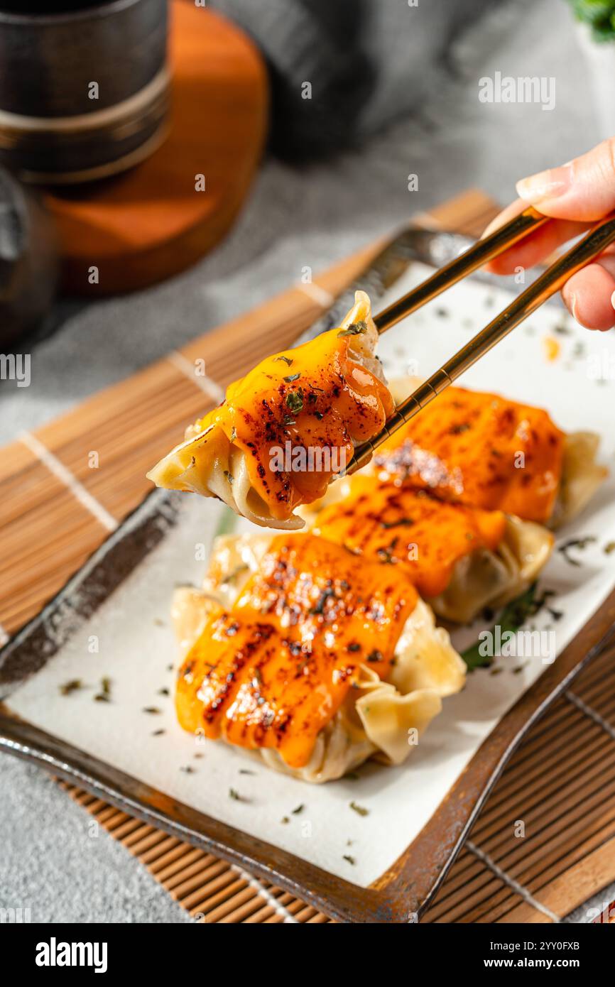 Grilled gyoza japanese dumplings foods with mentai sauce Stock Photo ...