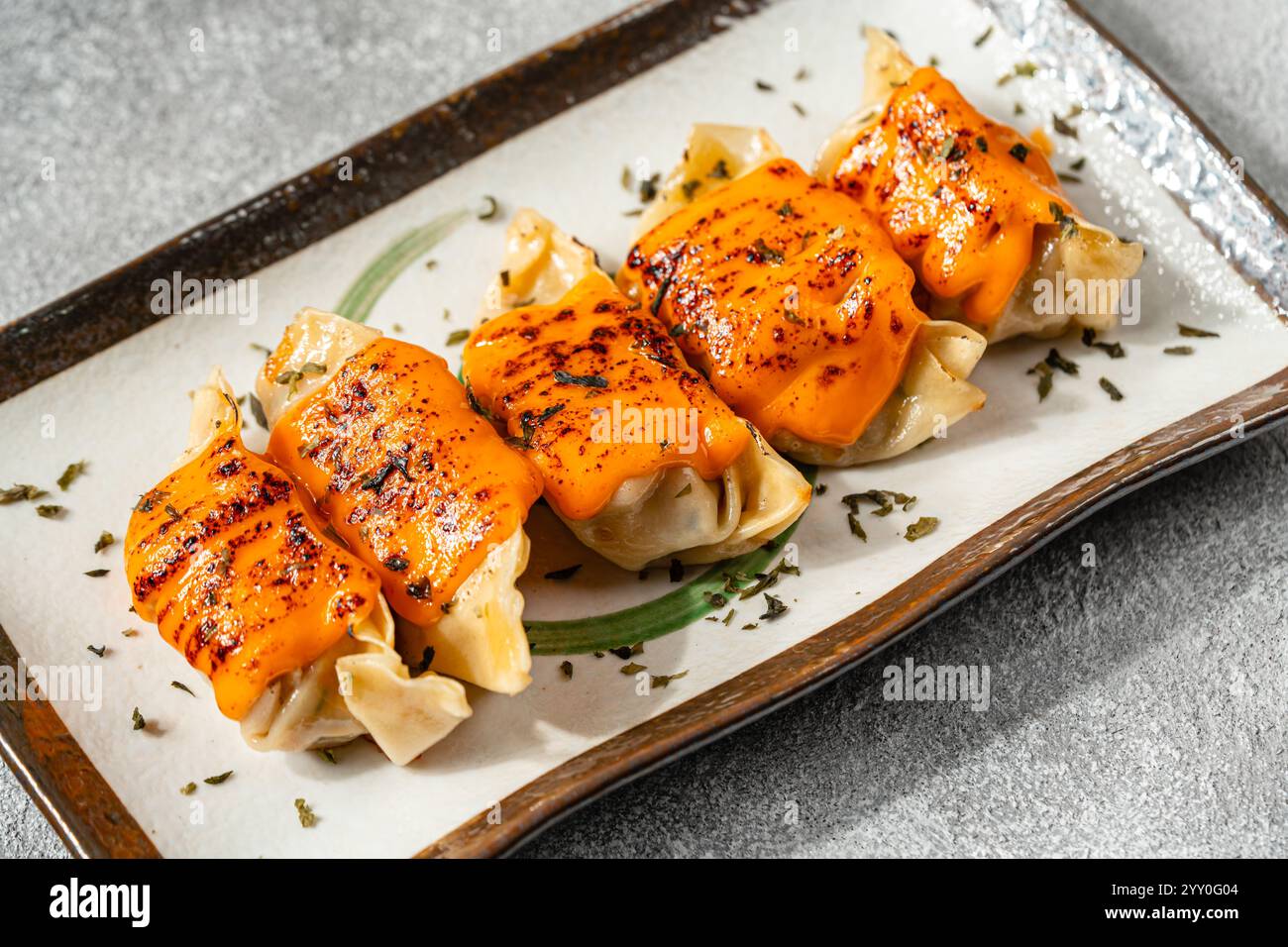 Grilled gyoza japanese dumplings foods with mentai sauce Stock Photo ...