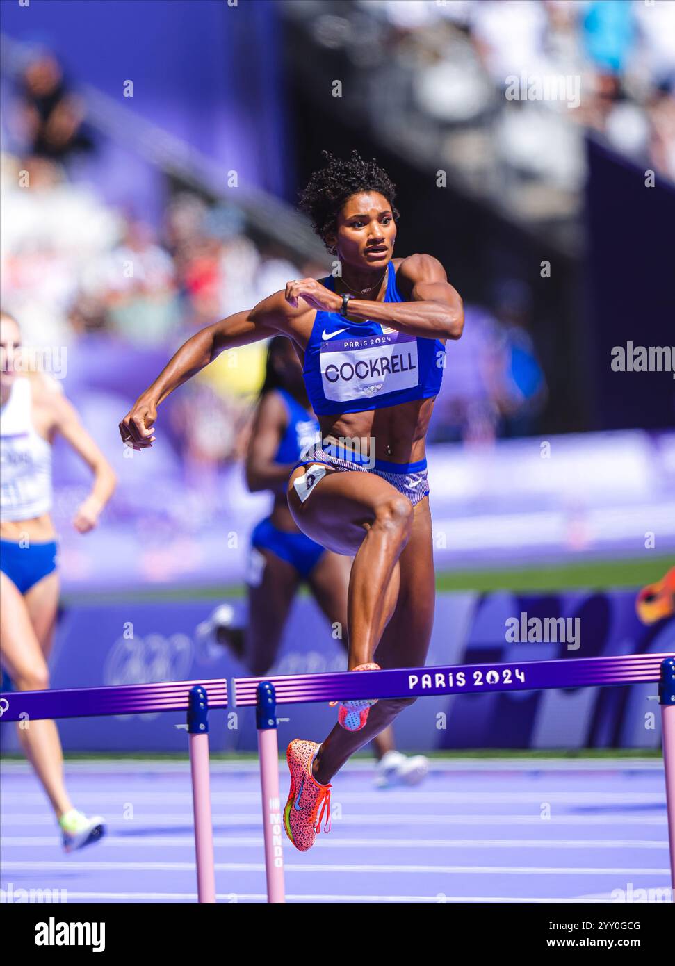 Anna Cockrell participating in the 400 meters hurdles at the Paris 2024 ...
