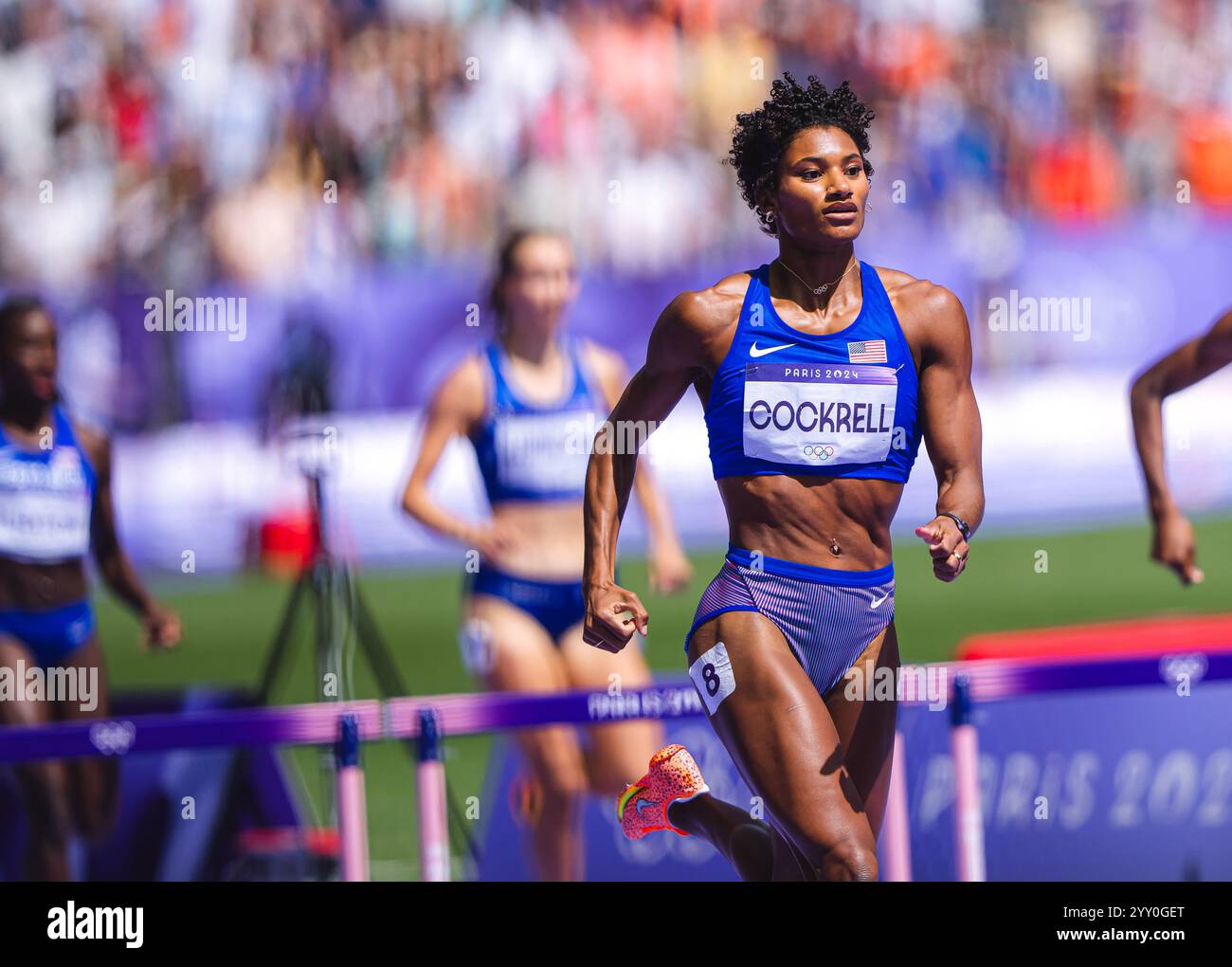 Anna Cockrell participating in the 400 meters hurdles at the Paris 2024 ...