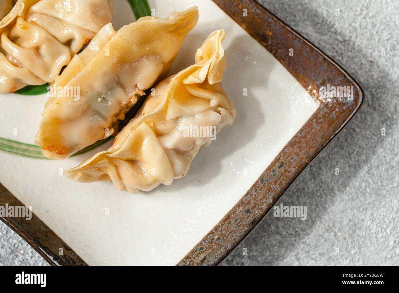 Golden fried dumplings jiaozi hi-res stock photography and images - Alamy