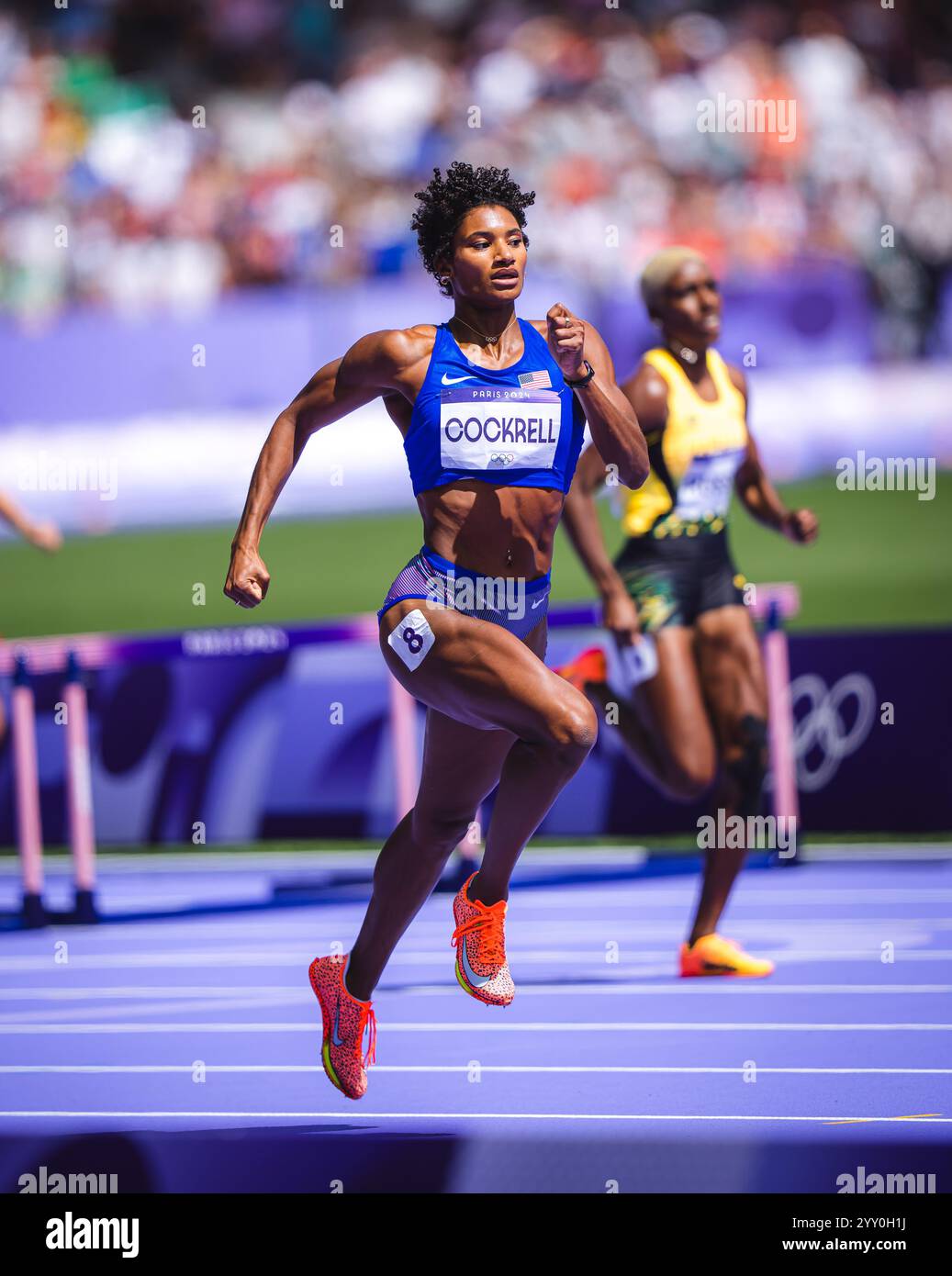 Anna Cockrell participating in the 400 meters hurdles at the Paris 2024 ...