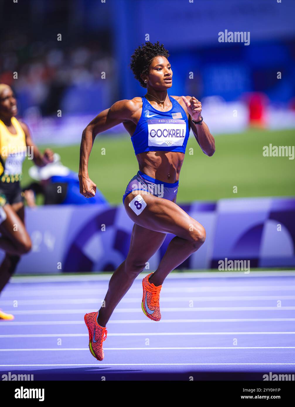 Anna Cockrell participating in the 400 meters hurdles at the Paris 2024 ...