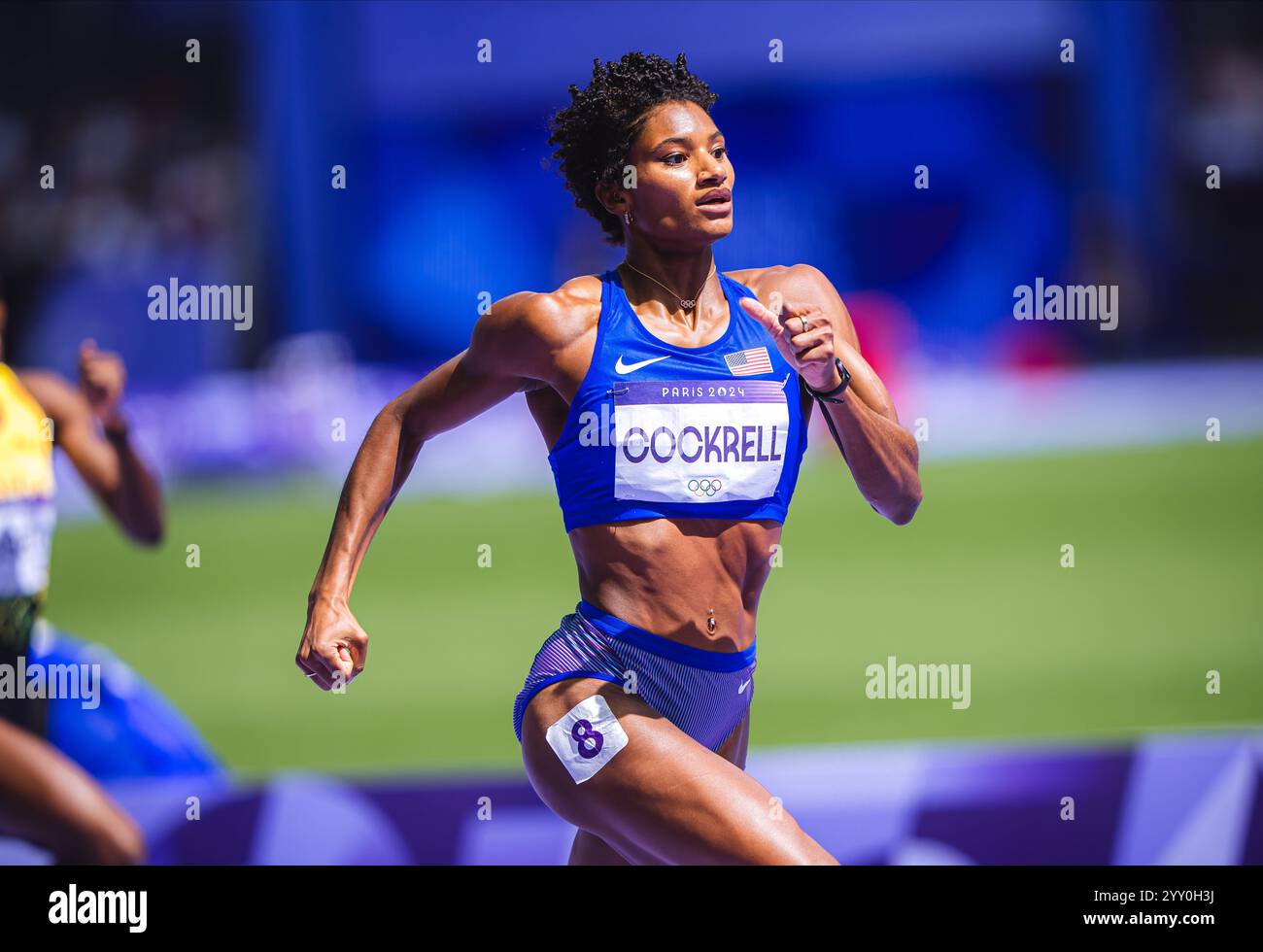Anna Cockrell participating in the 400 meters hurdles at the Paris 2024 ...