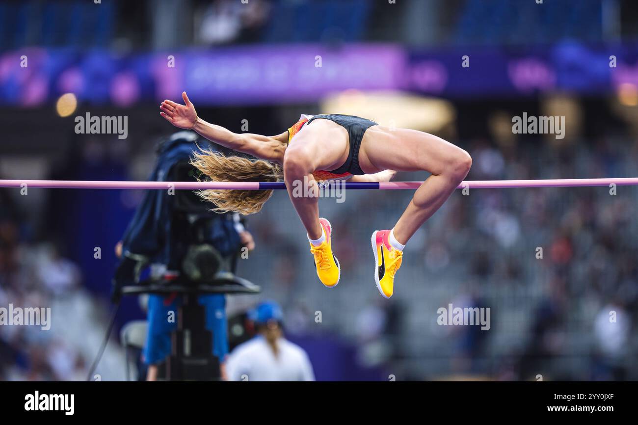 Christina Honsel participating in the high jump at the Paris 2024 ...