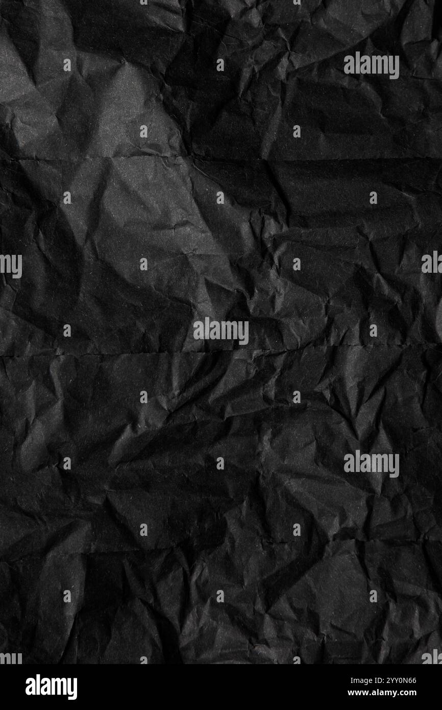 Texture of black crumpled paper. Dark paper background with chaotic ...