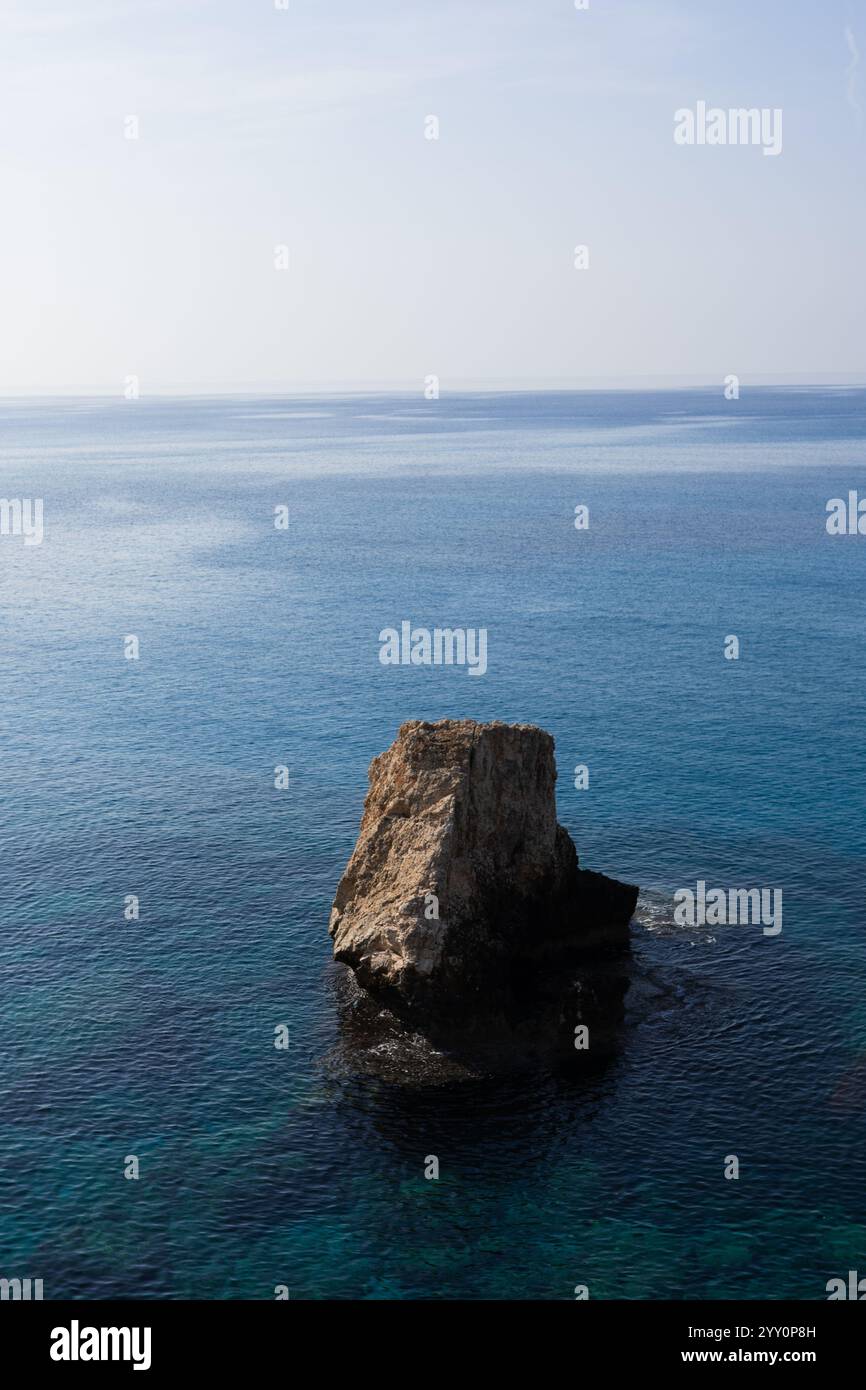 View of single rock in Cyprus with crystal clear turquoise sea Stock ...