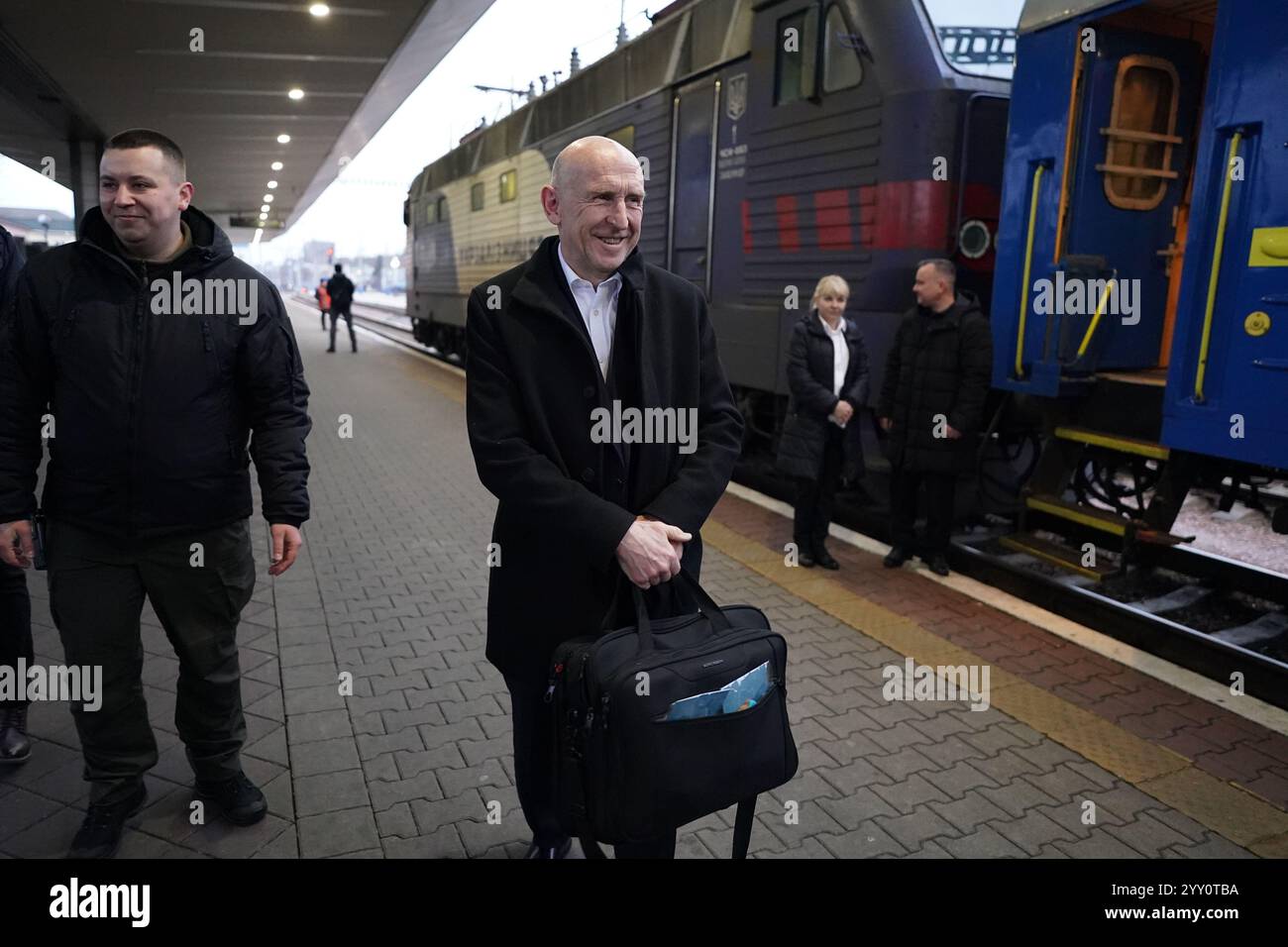 Defence Secretary John Healey arrives at a train station in Kyiv during ...