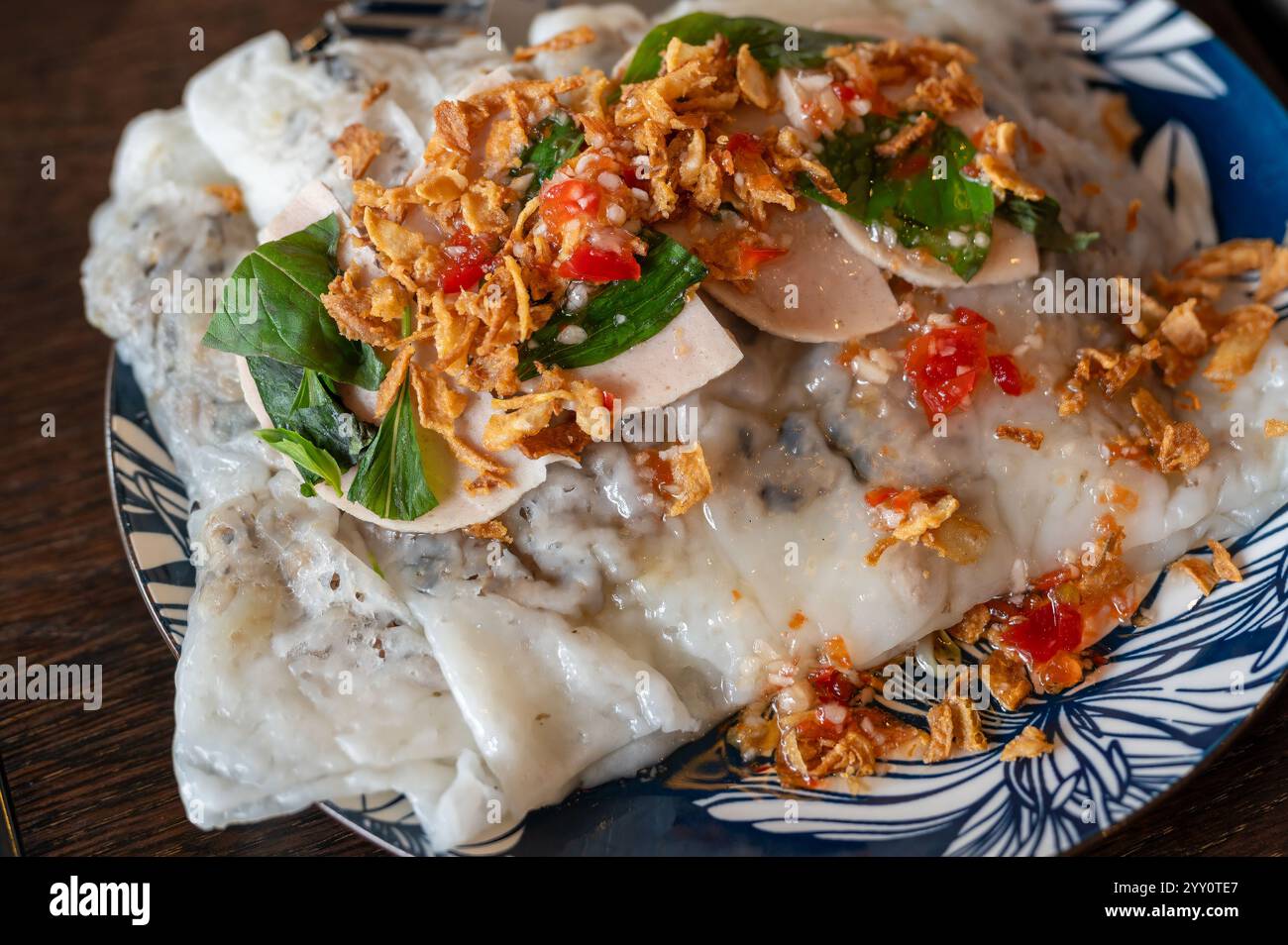 Vietnamese Banh Cuon Rice Rolls with Fried Shallots and Fresh Herbs ...