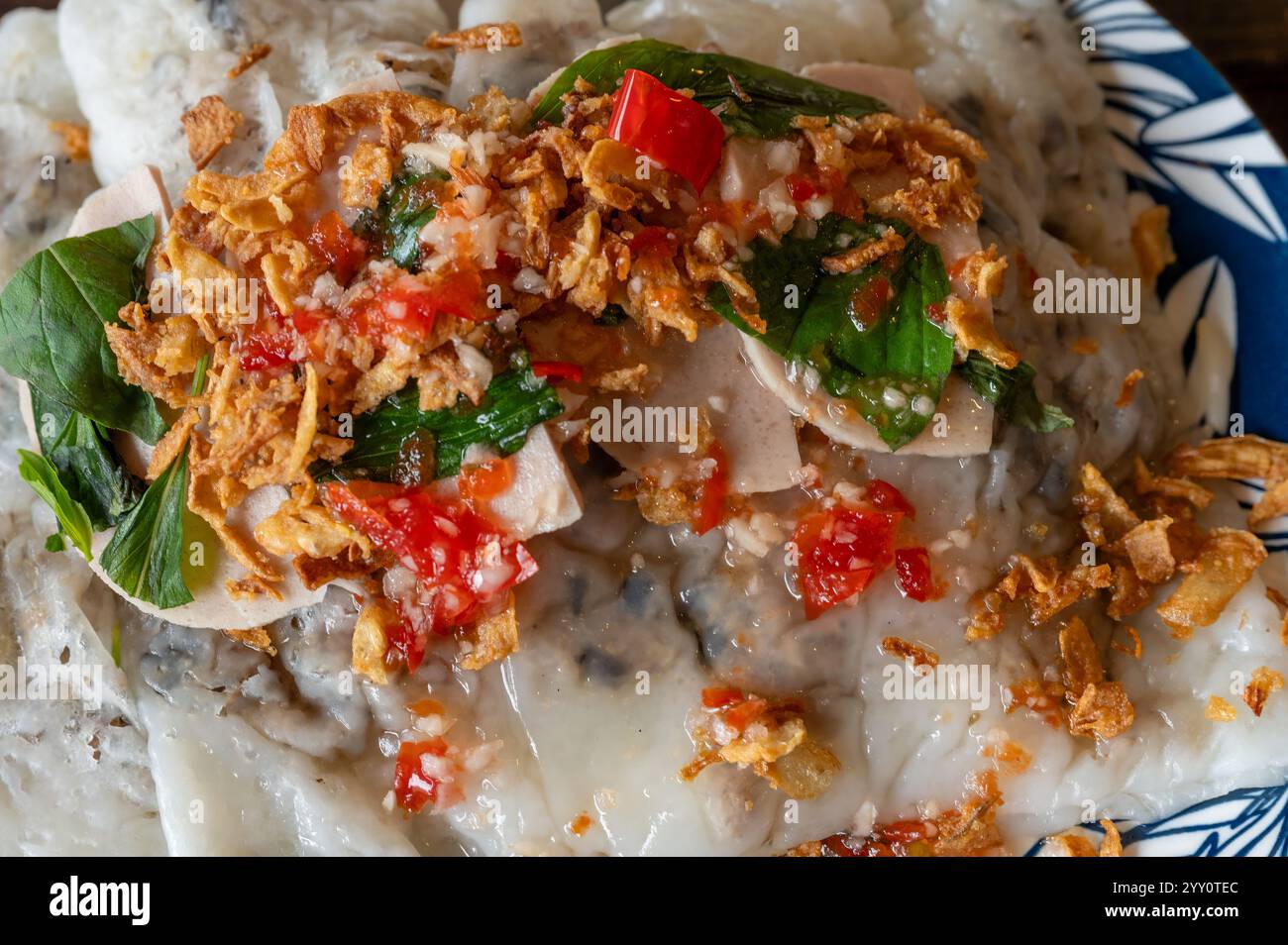 Vietnamese Banh Cuon Rice Rolls with Fried Shallots and Fresh Herbs ...