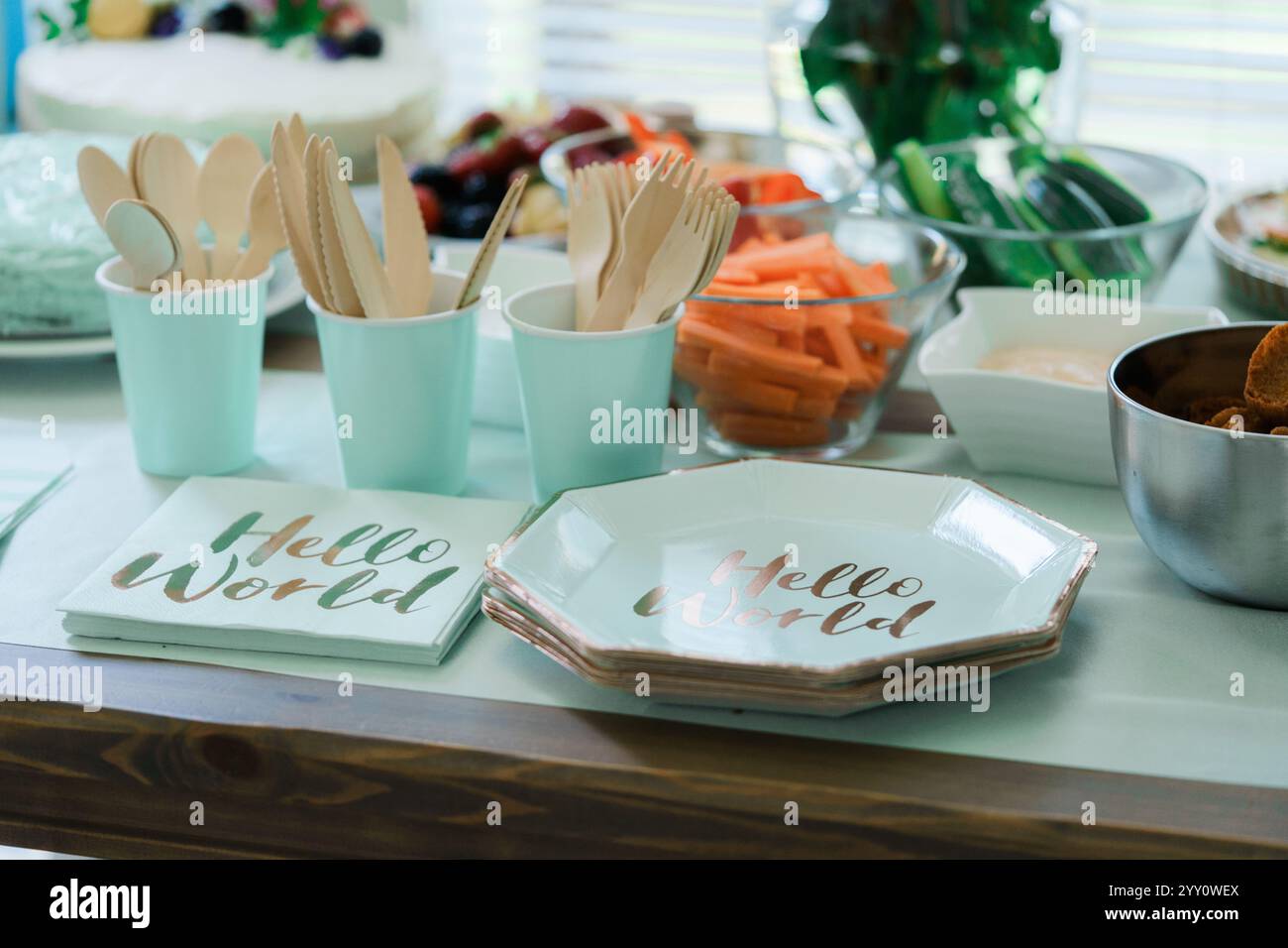 Catering table babyshower setting with cutlery, plates and cutlery ...