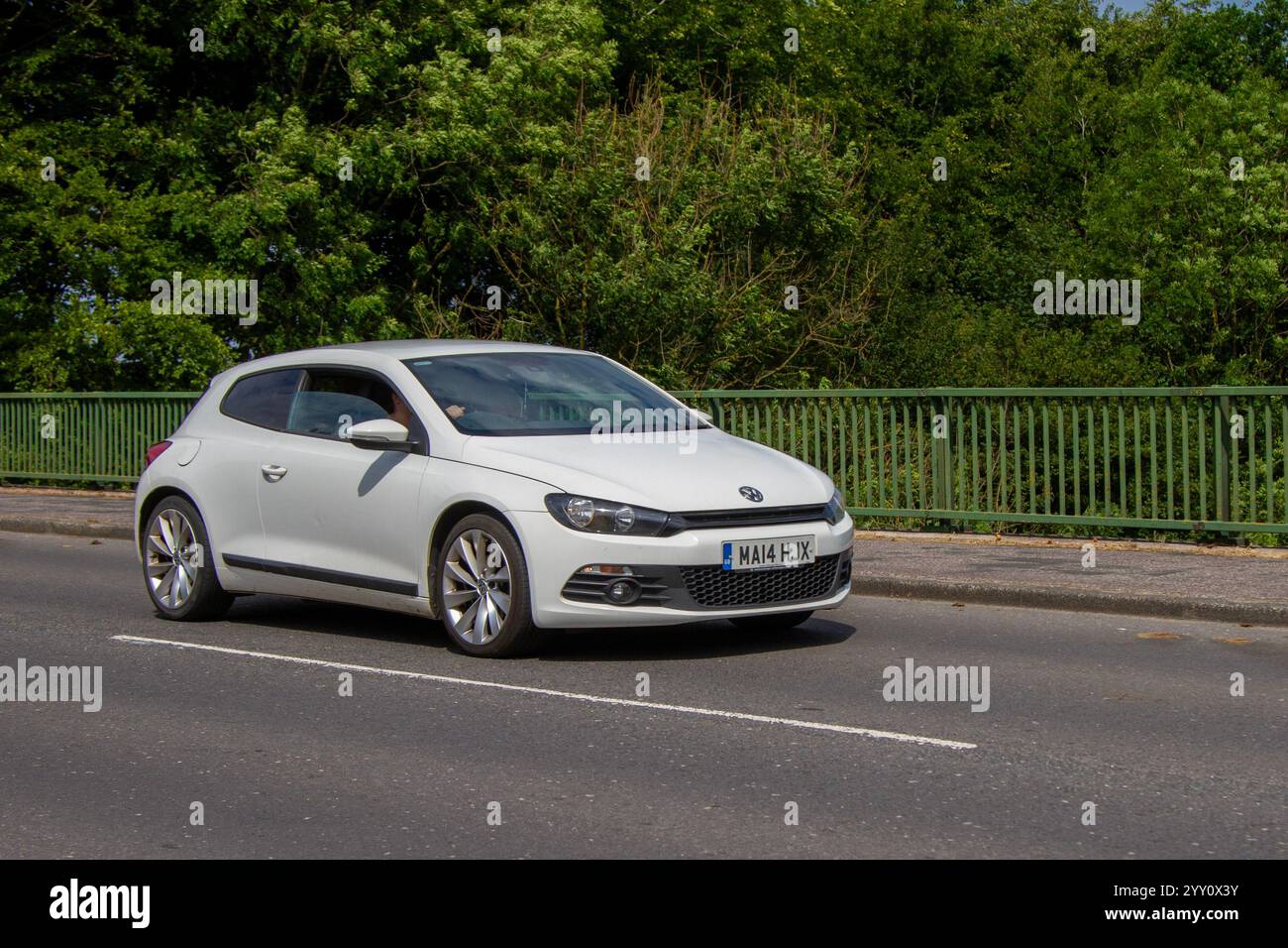 2004 White Volkswagen Scirocco Bluemotn Tech TD, DSG 2d car travelling ...