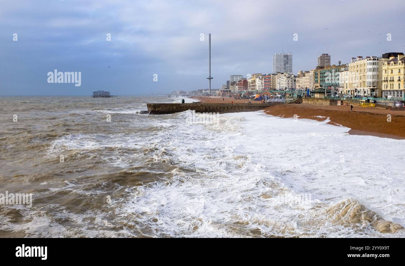 Brighton UK 18th December 2024 - Waves roll in on Brighton beach and ...