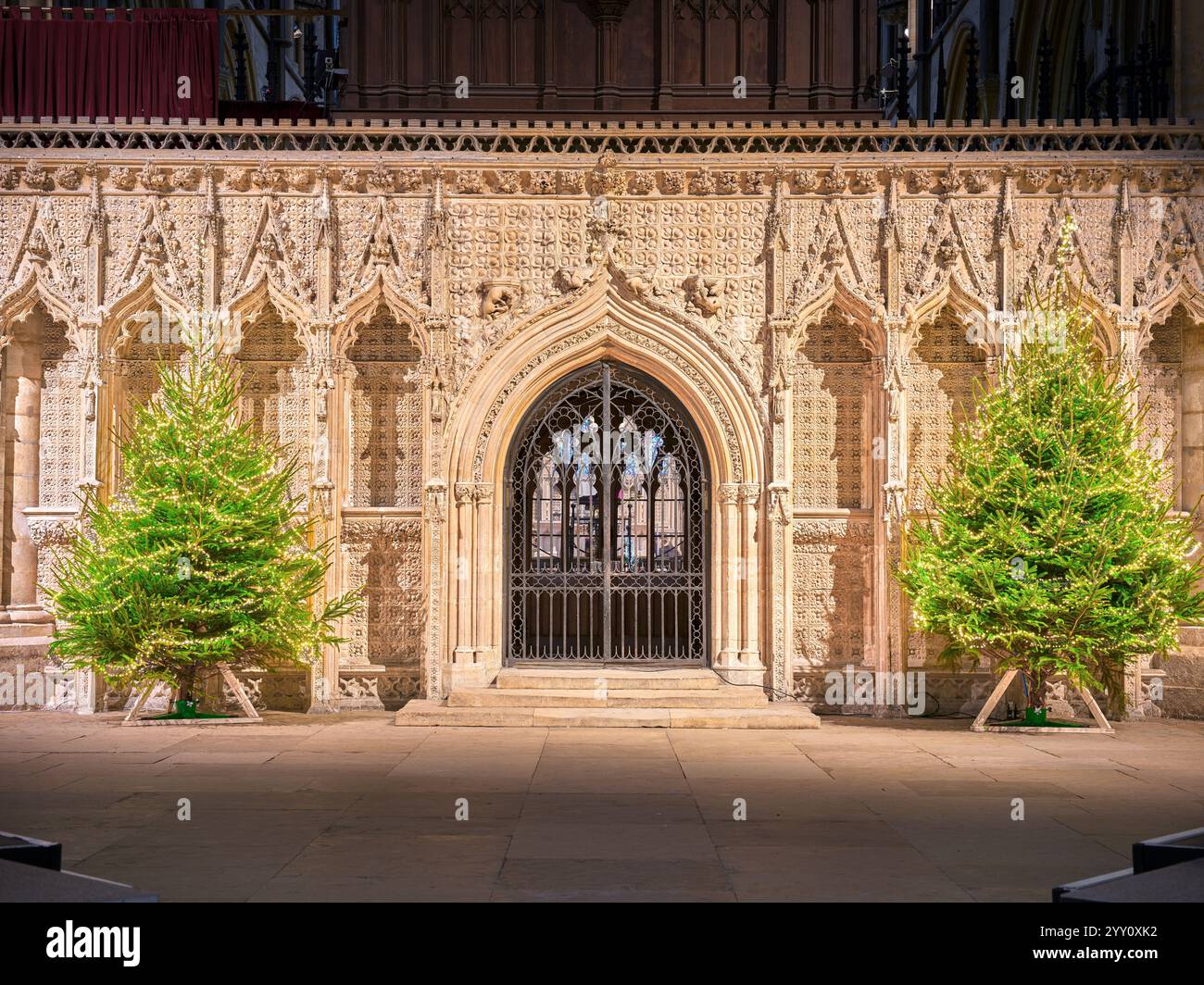 Pair of christmas trees outside the rood screen in the christian ...