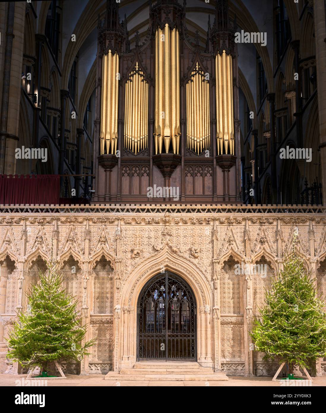Pair of christmas trees outside the rood screen in the christian ...