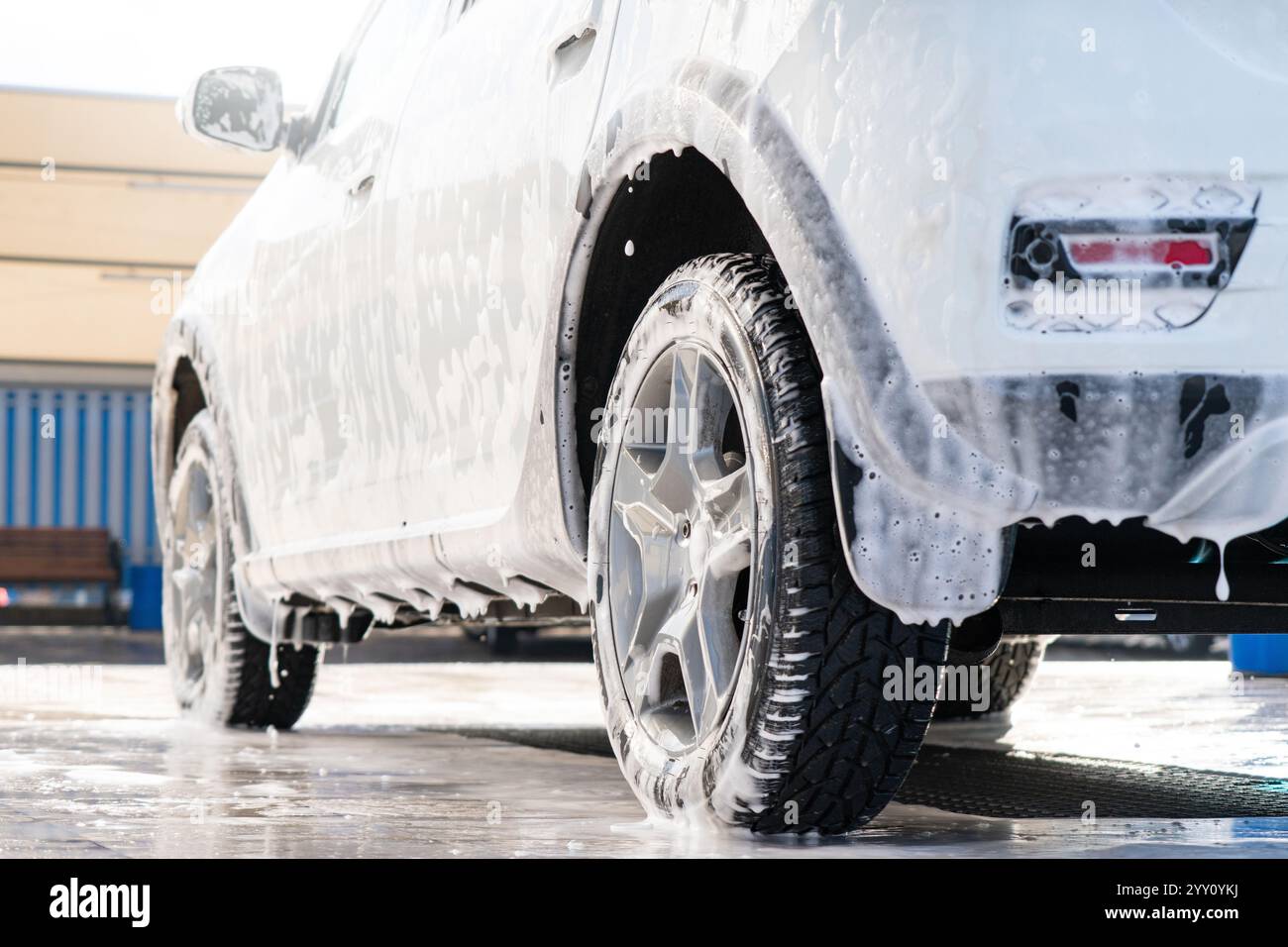Self service high pressure car wash. Vehicle covered with foam Stock ...