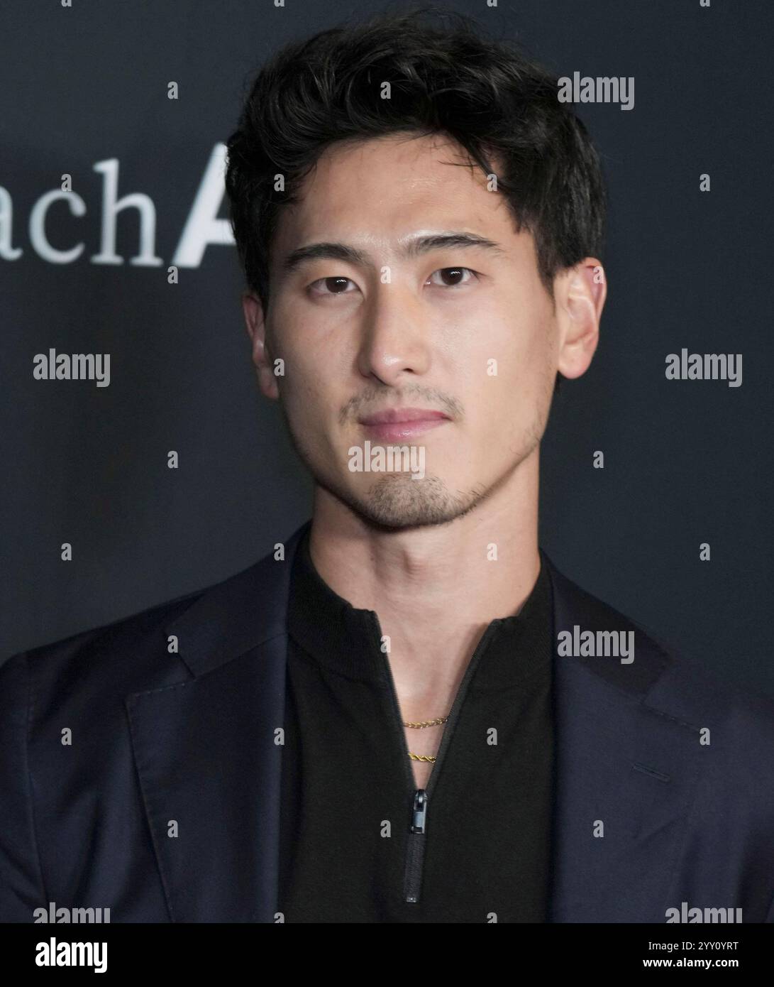 Andrew Kang arrives at the 2024 UNTAMED Agency AAPI Holiday Charity ...