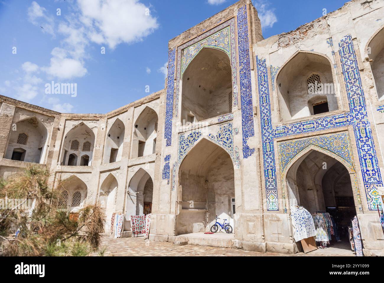 Courtyard of the Abdulaziz-Khan Madrasah is an ancient madrassah in ...