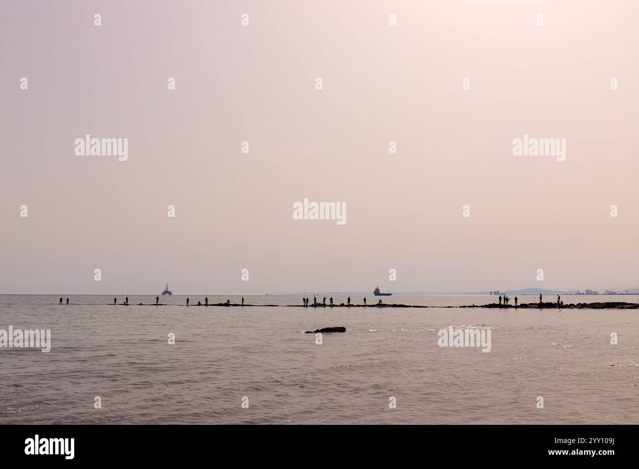 Fishermen from the ridge catch fish in the Caspian Sea. Baku ...