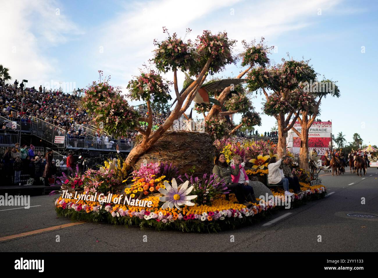 FILE - The city of Torrance, Calif., float moves along the parade route ...