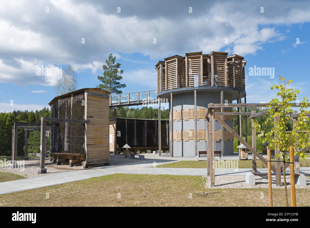 Modern wooden construction with round tower and evaporation walls ...