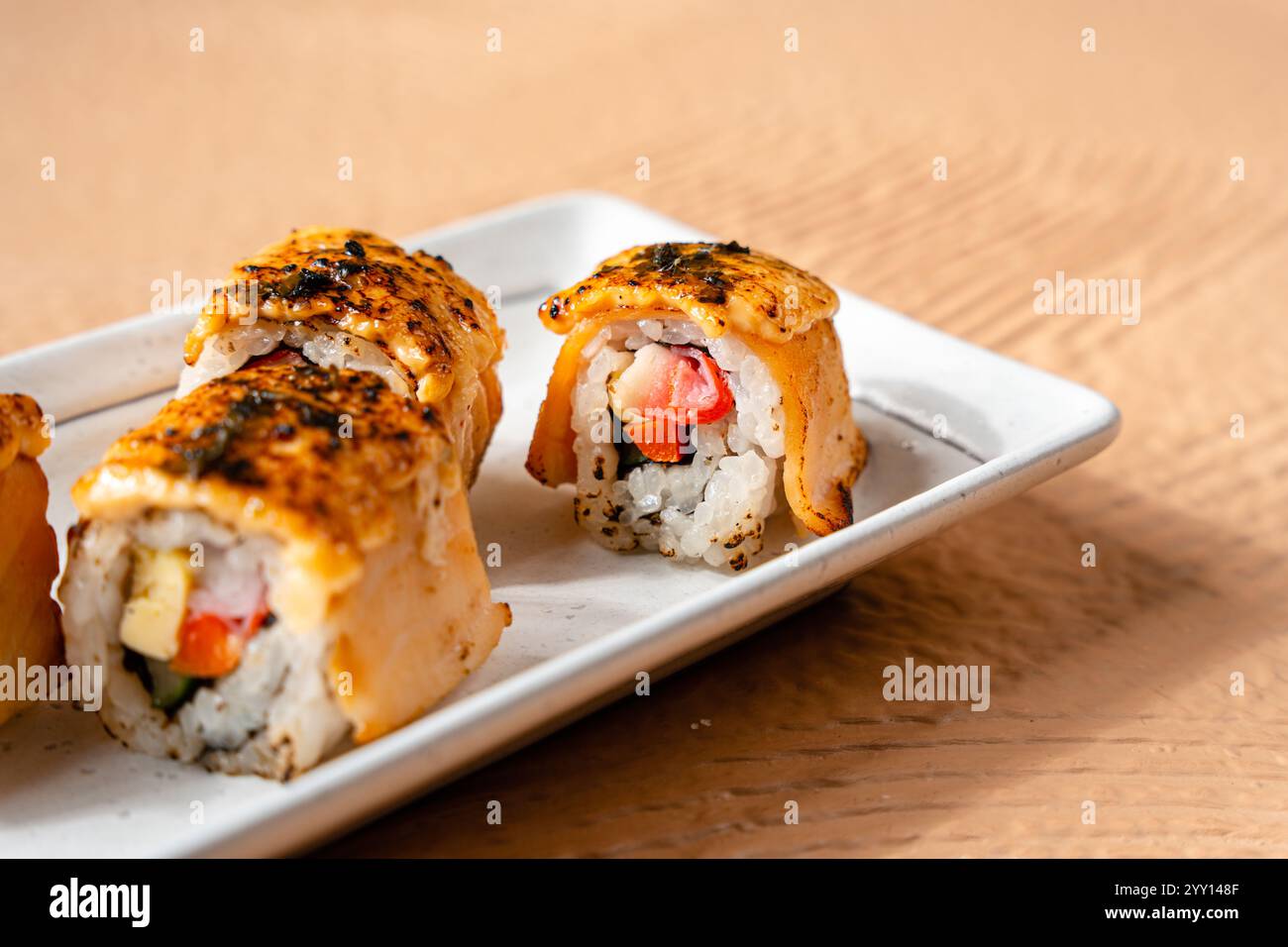 sushi is a Japanese dish of prepared vinegared rice, usually with some ...