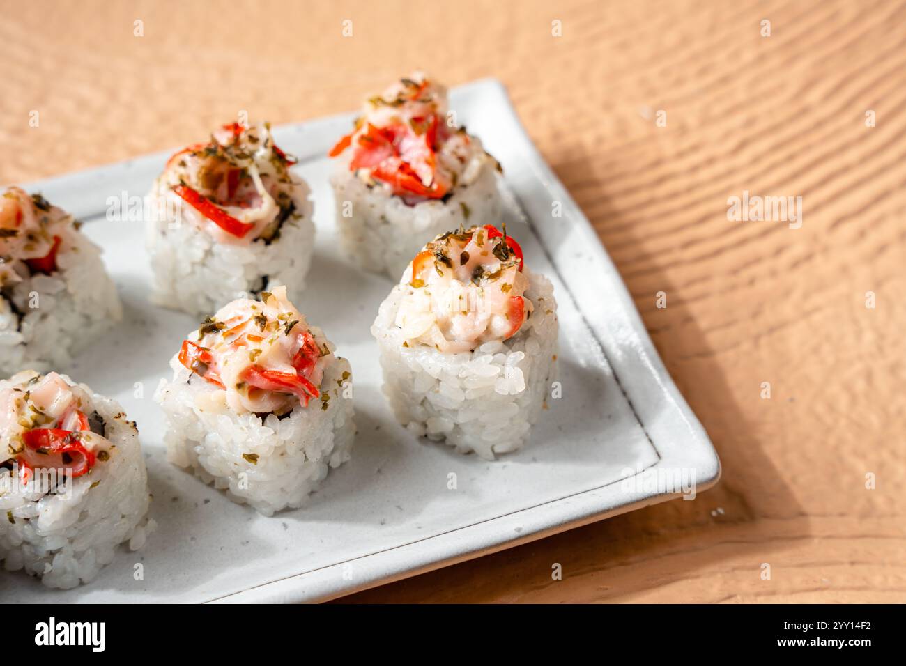 sushi is a Japanese dish of prepared vinegared rice, usually with some ...