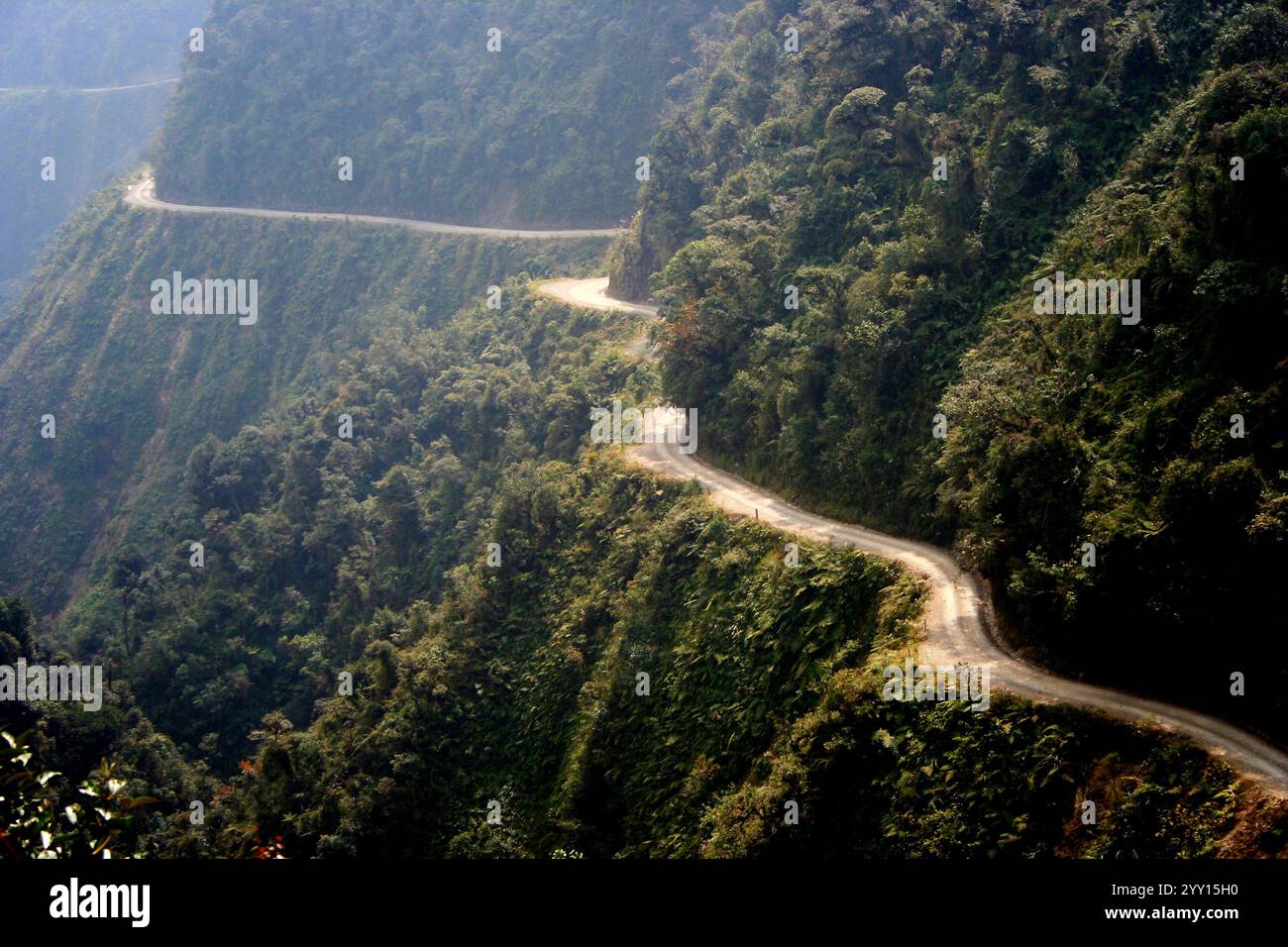 Bolivia's Death Road. Narrow, winding road carved into the side of a ...