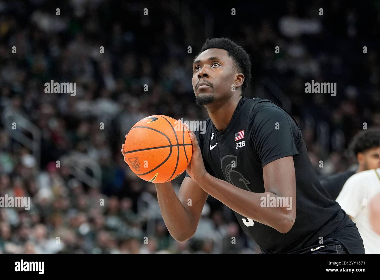 Michigan State forward Xavier Booker shoots a free throw during the ...