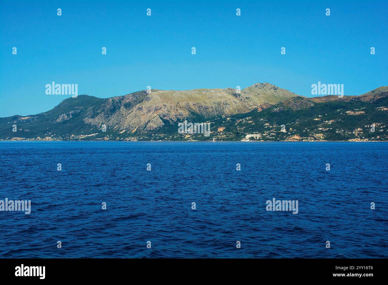 The Ionian coastline near Kalami, Corfu. Here, the green hills of the ...