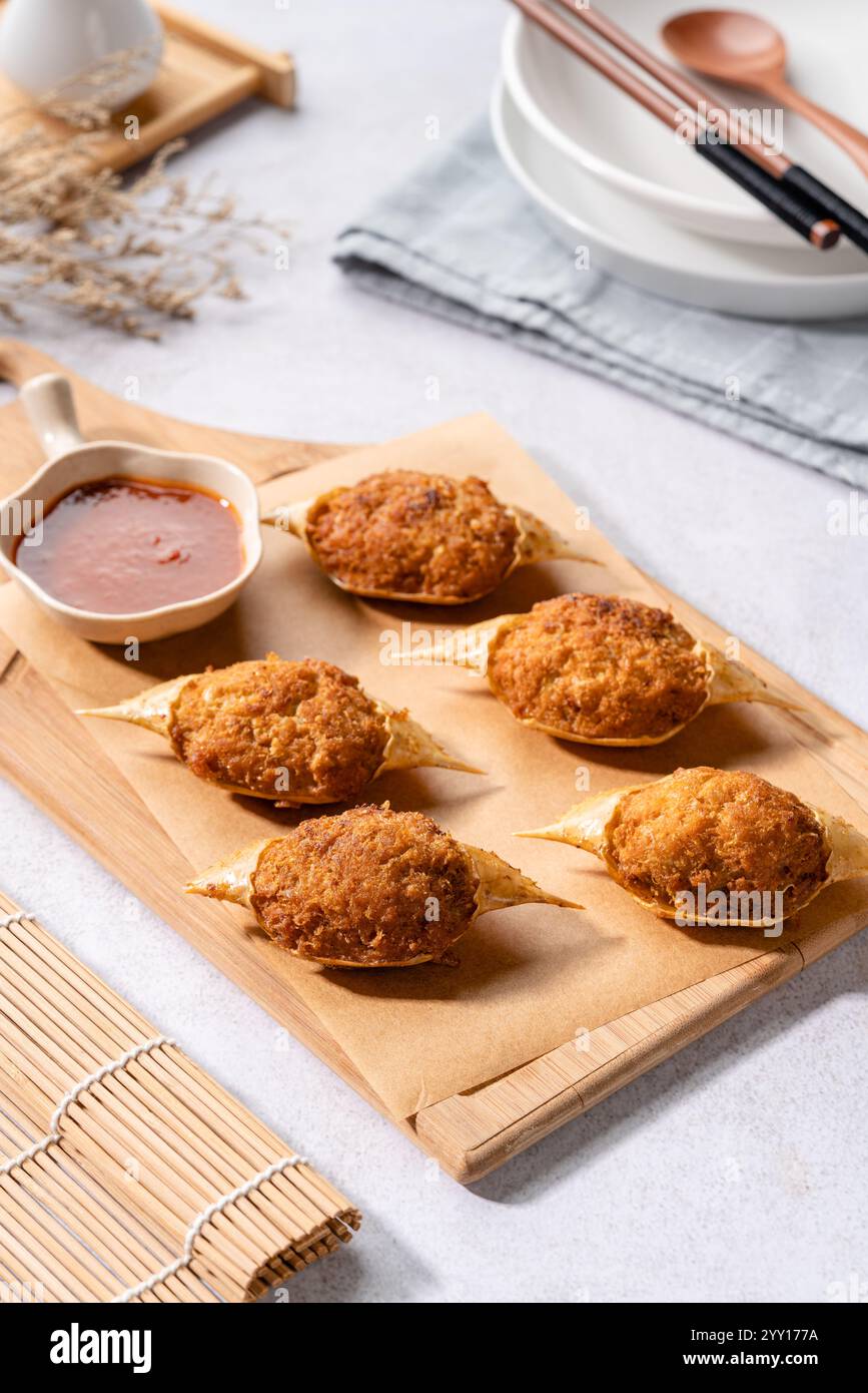 Grilled Crab with mentaiyaki sauce. Mentaiyaki is a typical Japanese ...