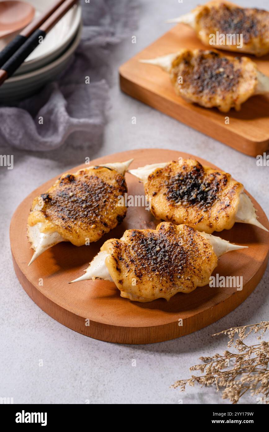 Grilled Crab with mentaiyaki sauce. Mentaiyaki is a typical Japanese ...