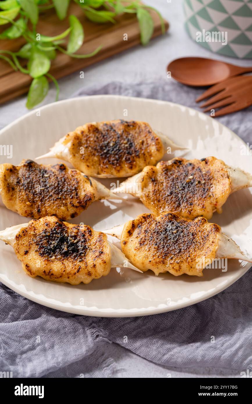 Grilled Crab with mentaiyaki sauce. Mentaiyaki is a typical Japanese ...