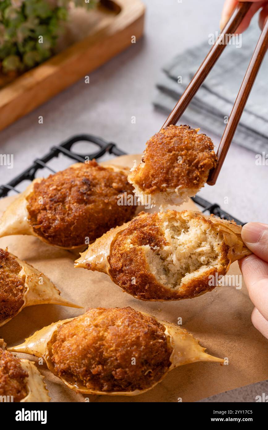Grilled Crab with mentaiyaki sauce. Mentaiyaki is a typical Japanese ...
