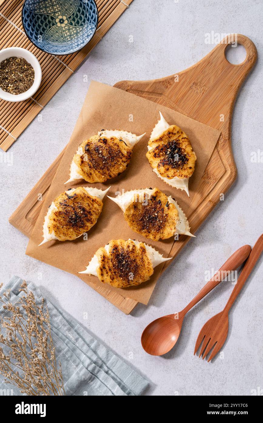 Grilled Crab with mentaiyaki sauce. Mentaiyaki is a typical Japanese ...