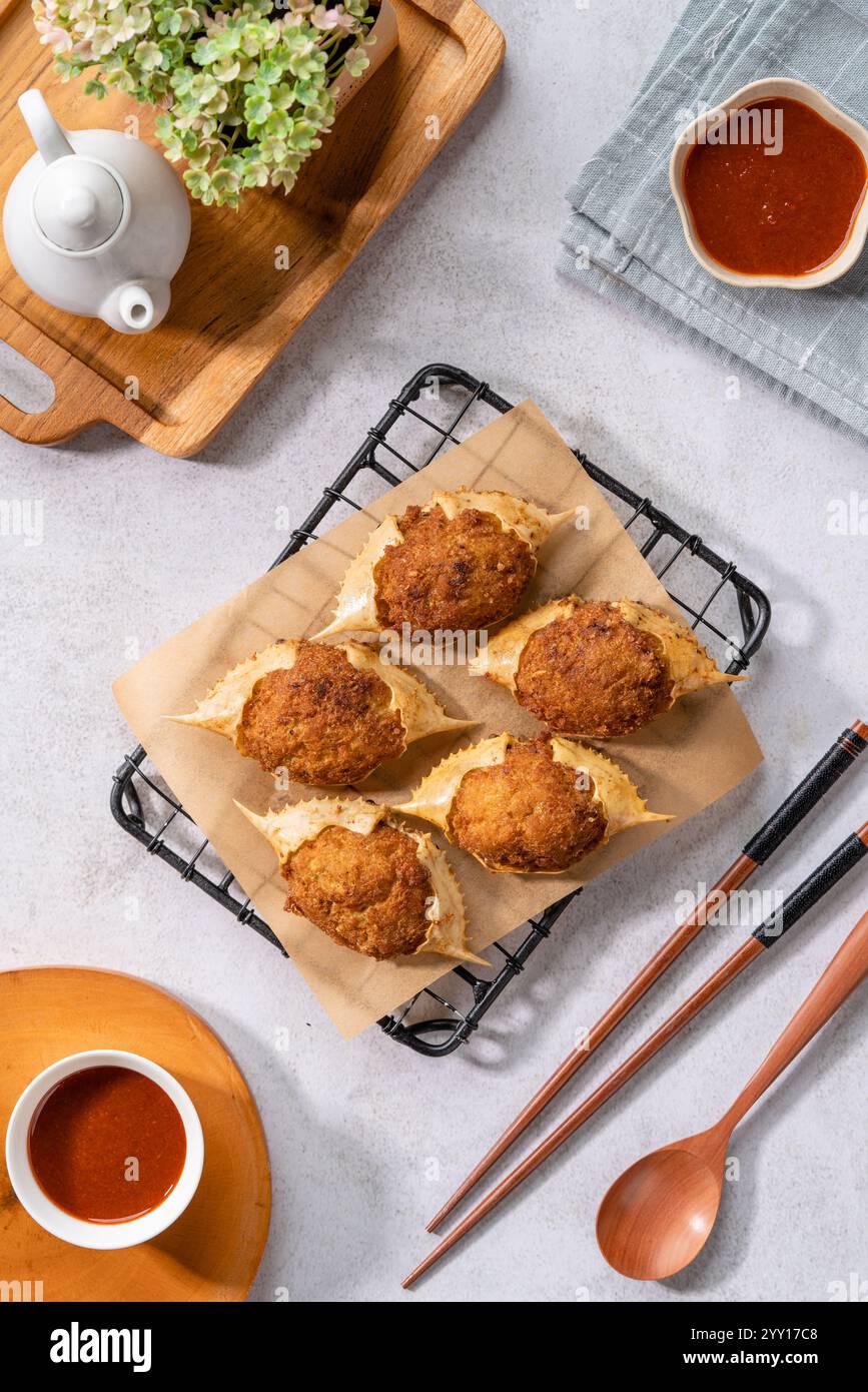 Grilled Crab with mentaiyaki sauce. Mentaiyaki is a typical Japanese ...
