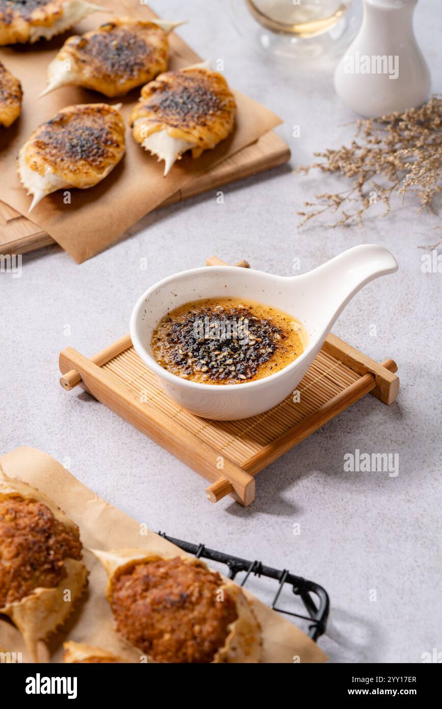 Grilled Crab with mentaiyaki sauce. Mentaiyaki is a typical Japanese ...