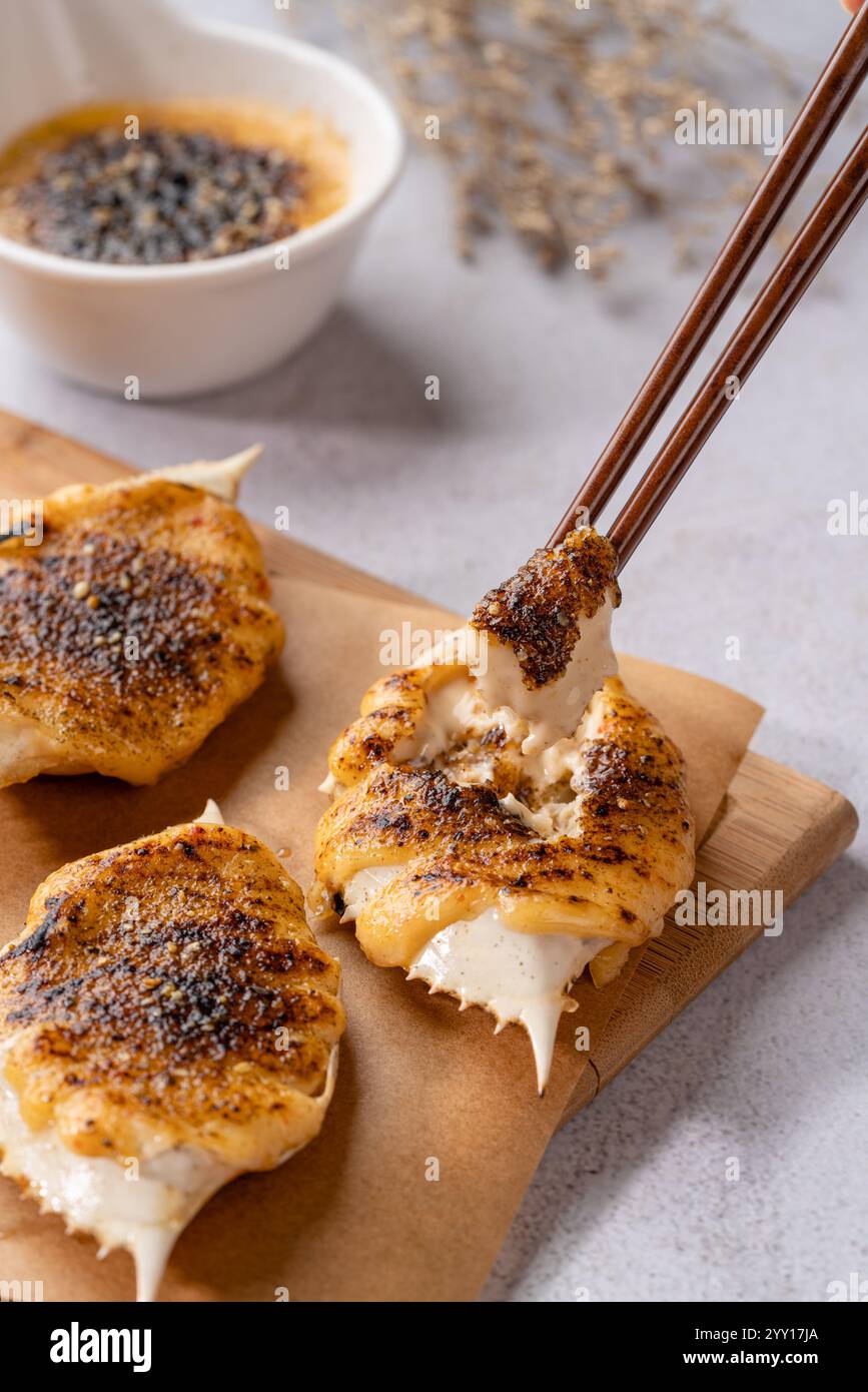 Grilled Crab with mentaiyaki sauce. Mentaiyaki is a typical Japanese ...