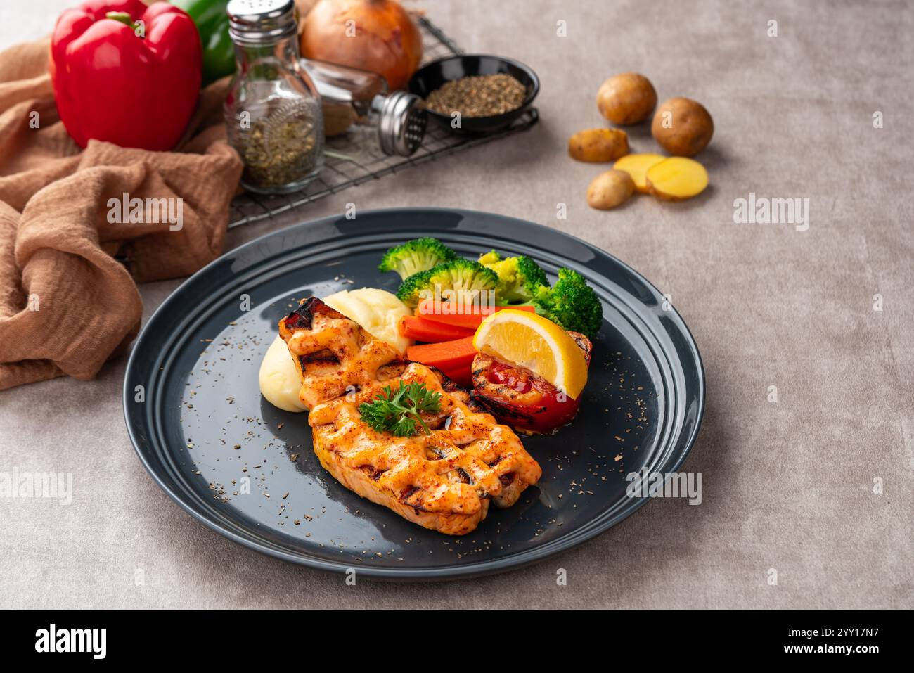 Grilled salmon fillets with mentai sauce and mash potato plating on ...